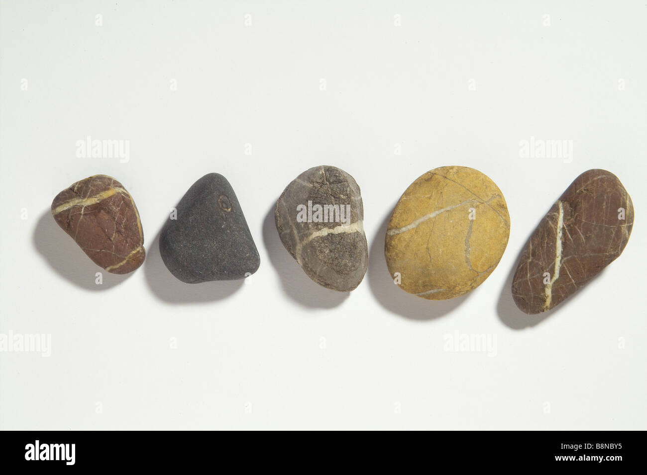 five pebbles - cut out Stock Photo - Alamy