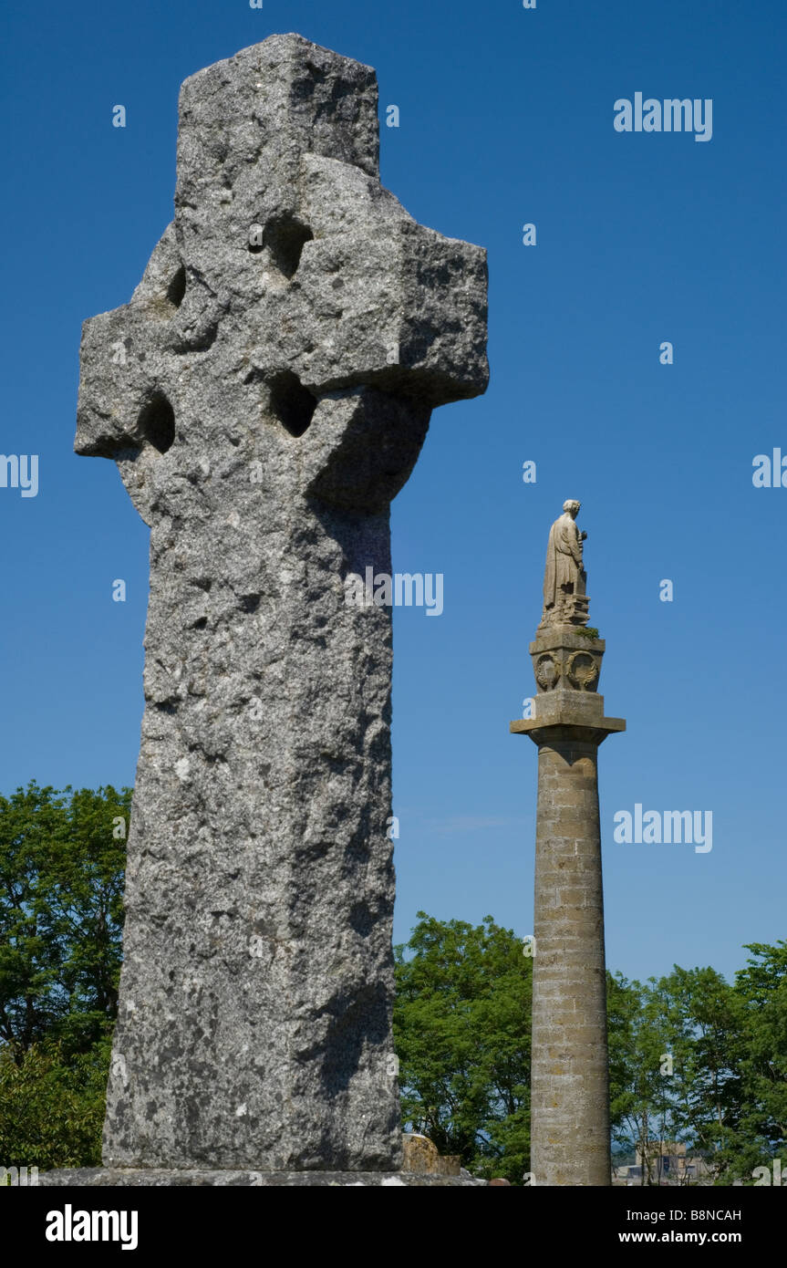 Cross and Statue of Hugh Miller in a churchyard Cromarty Northern ...