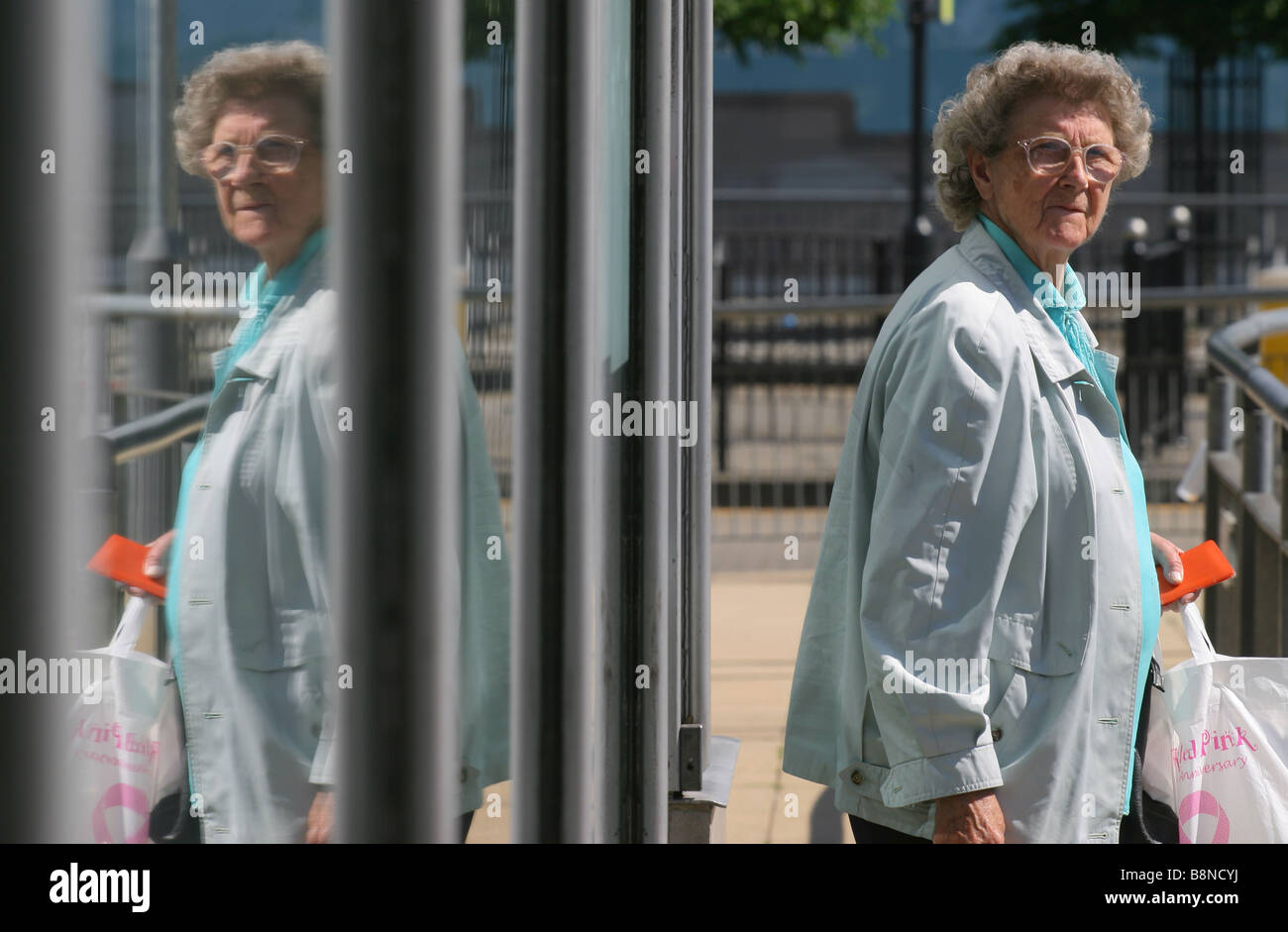 Old woman on a bus hi-res stock photography and images - Alamy