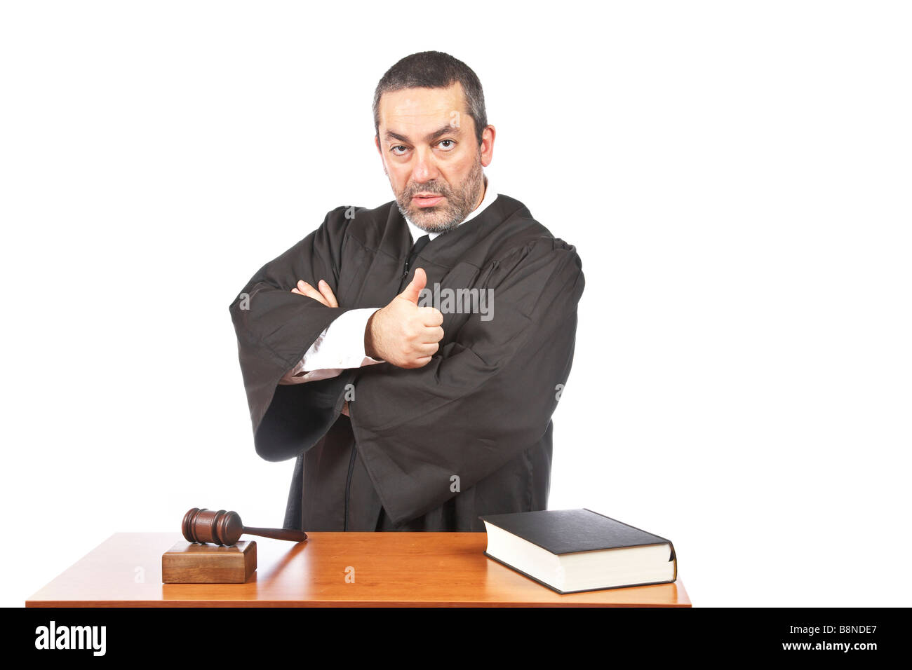 A serious male judge isolated on white background Ok gesture Stock ...