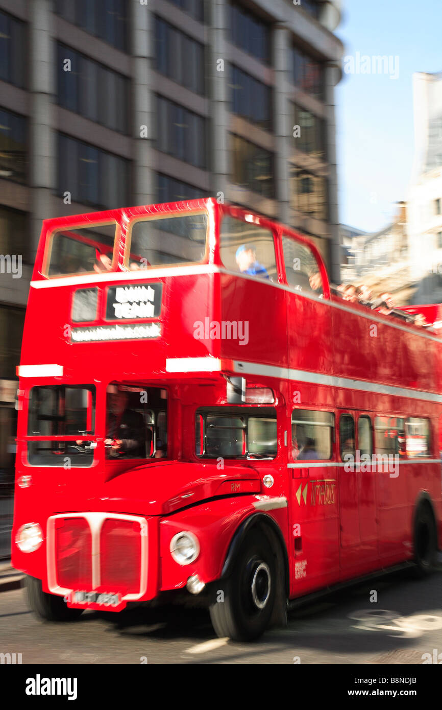 Red London Bus in the City of London Stock Photo - Alamy