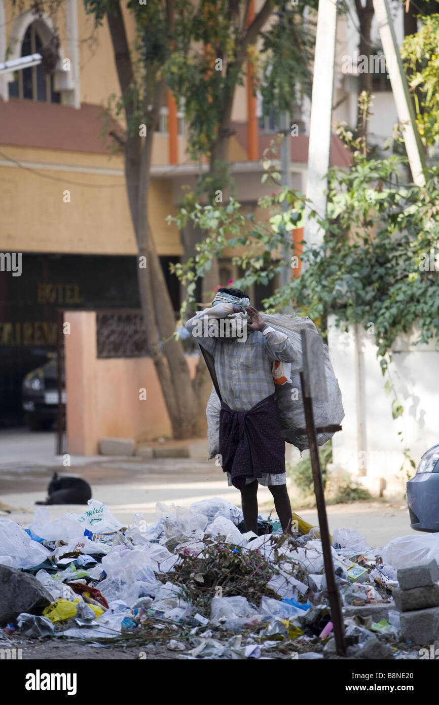 Indian man recycling Rubbish Stock Photo - Alamy