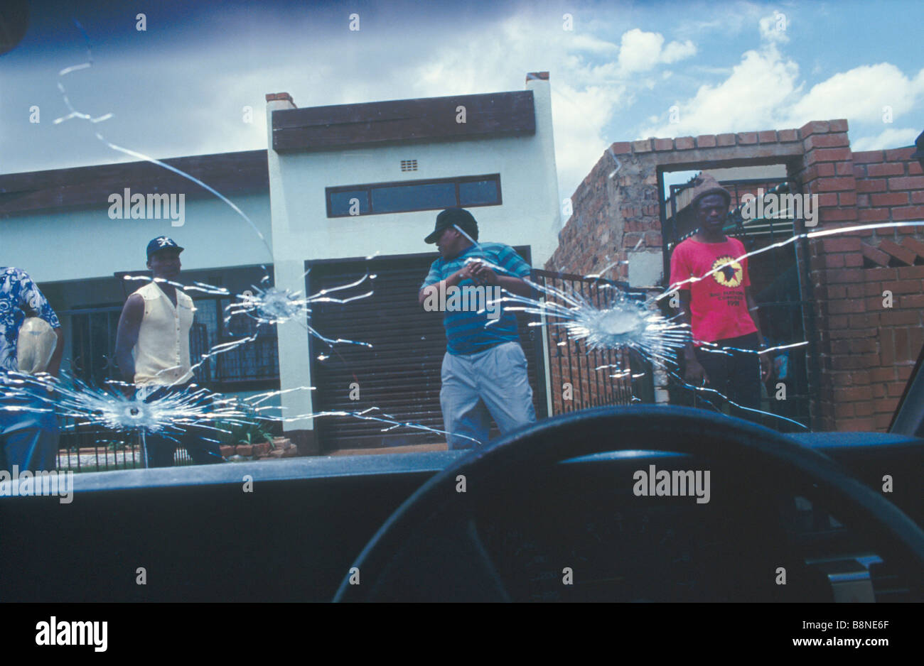 A Hit squad in Eastern Rand 1993 stands in front of the bullet riddled ...