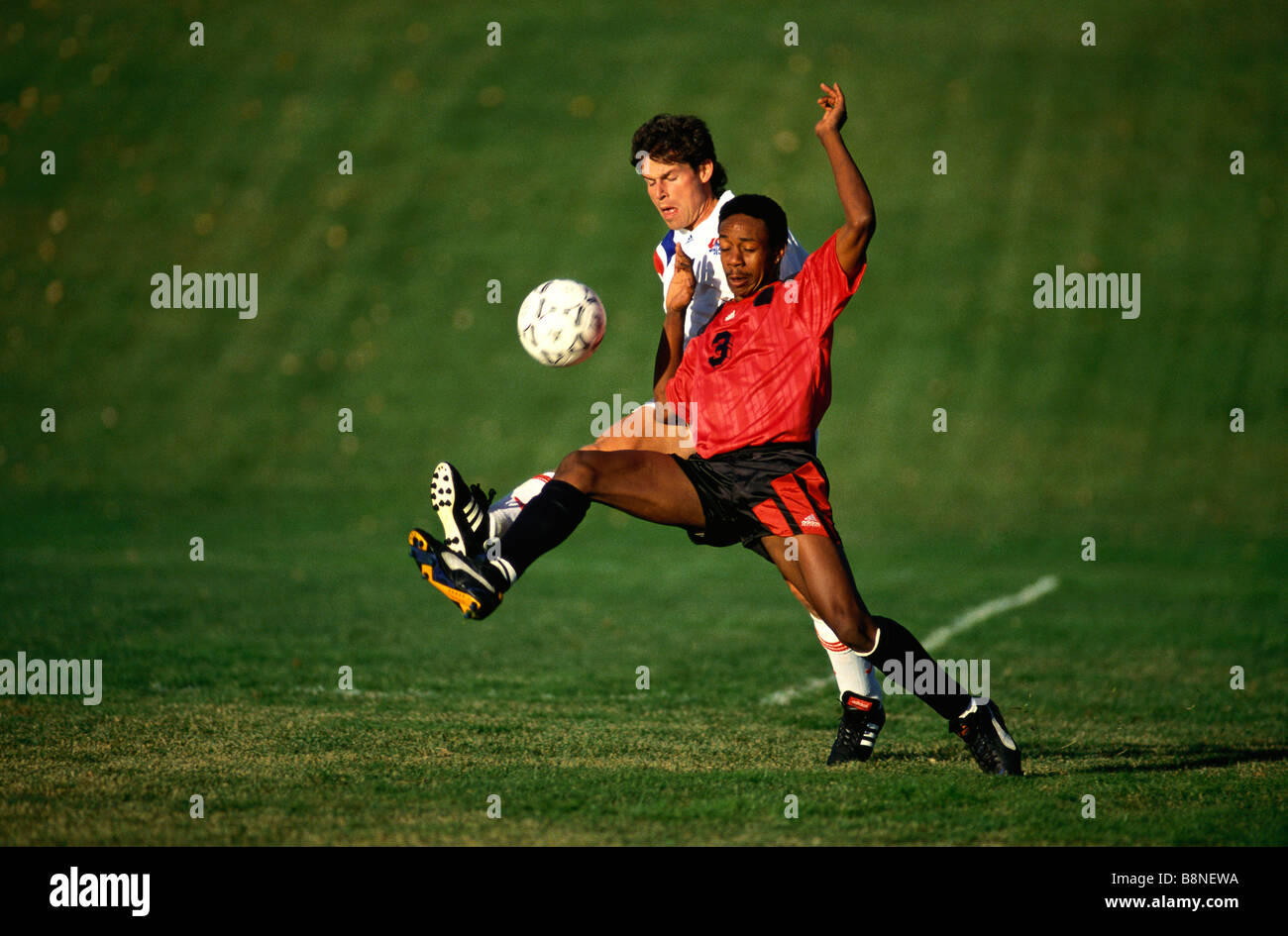 Soccer game action Stock Photo - Alamy