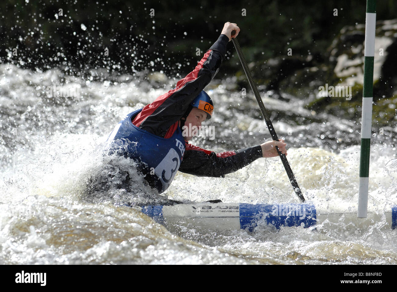 A canoeist negotiates the rapids on a Scottish River Stock Photo - Alamy