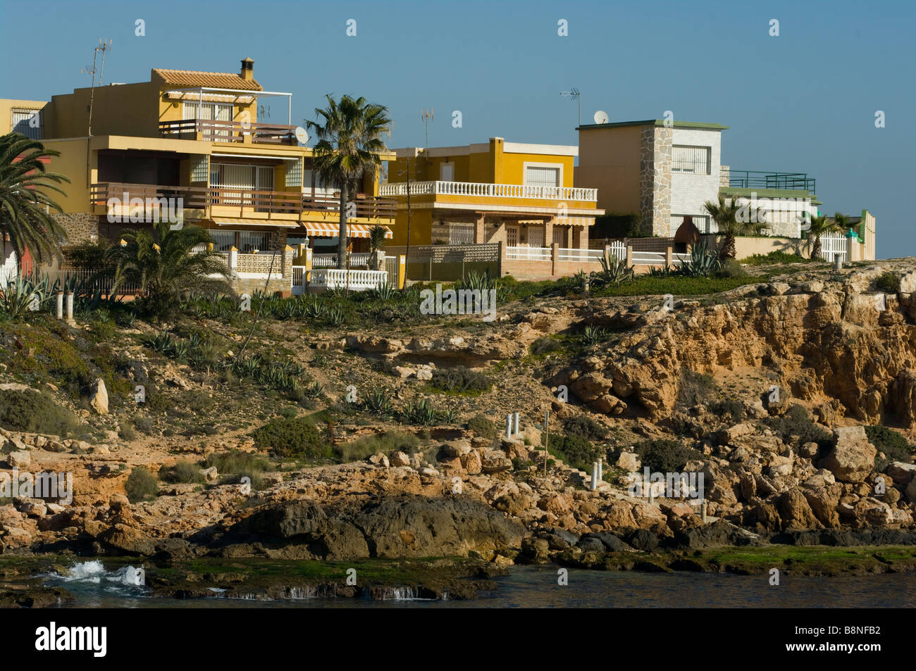 spanish Villas Buildings On The Rocky Foreshore Cliffs Of The ...