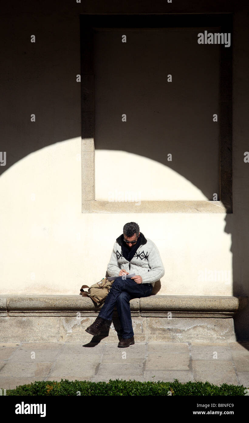 santiago de compostela old university figure reading Stock Photo - Alamy