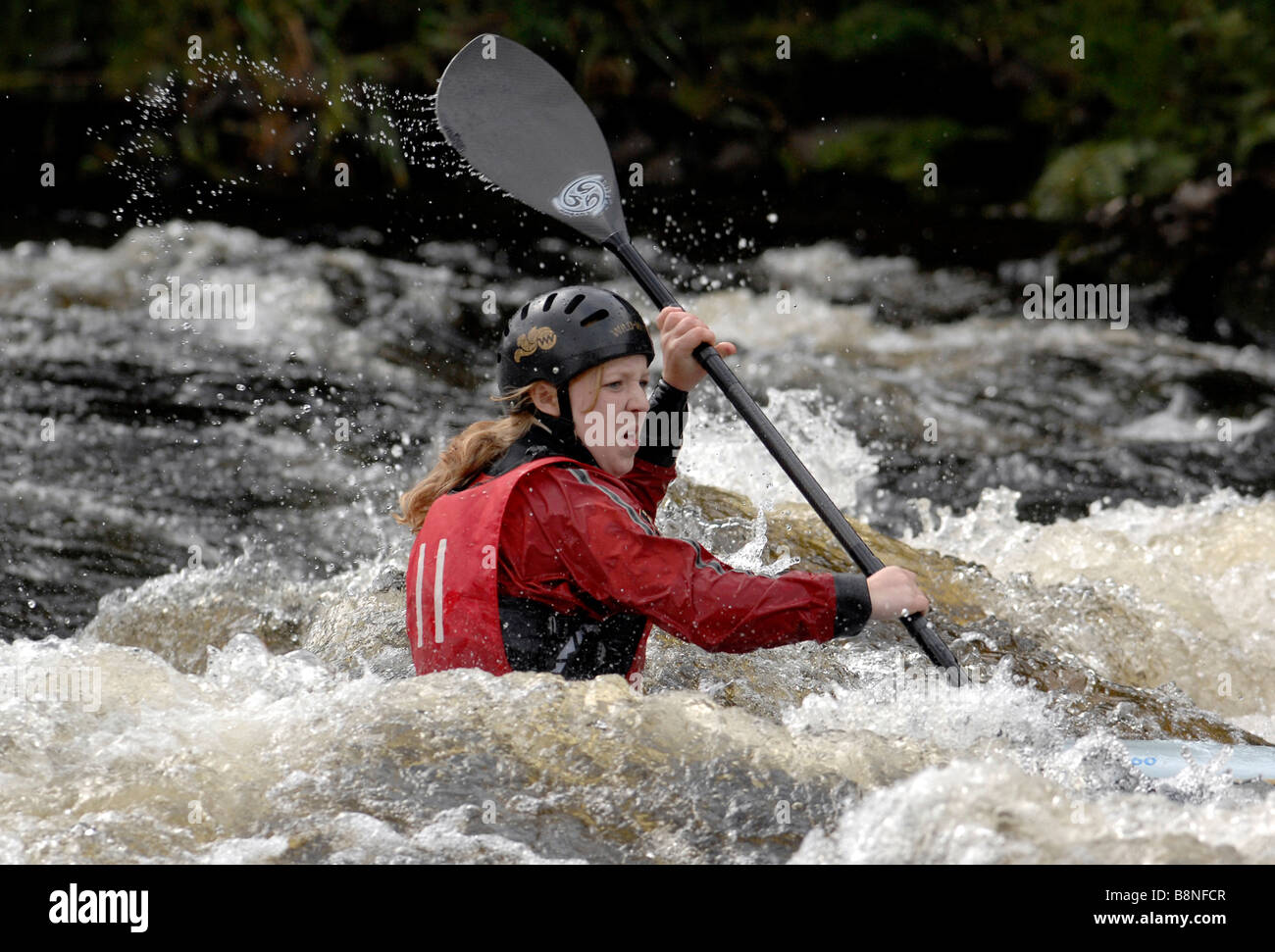 A canoeist negotiates the rapids on a Scottish River Stock Photo - Alamy