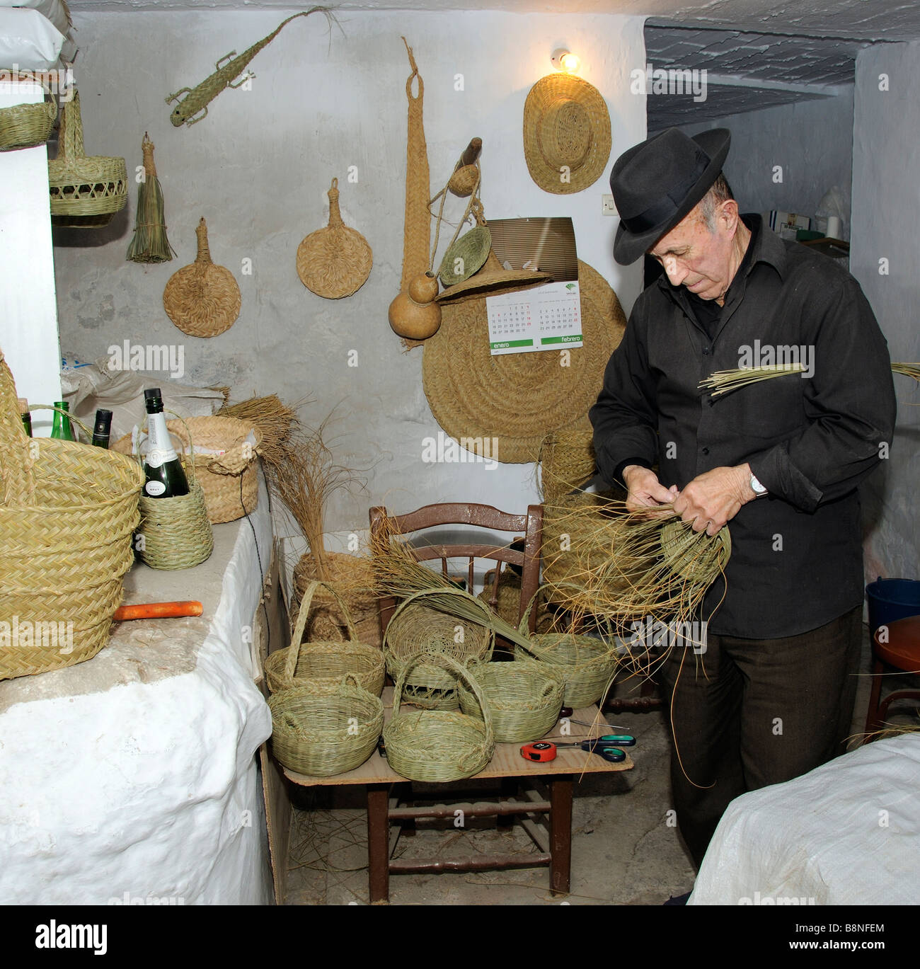 Weaving esparto grass to make baskets a spanish craftsman working in ...