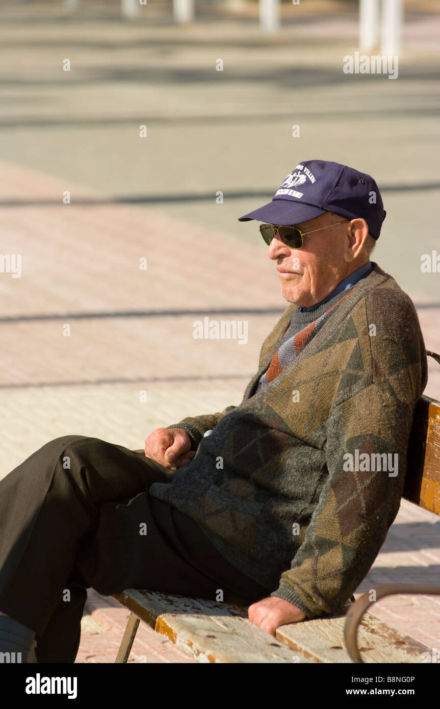 Elderly spanish person Man Male Gentleman Sat In The Sun Sitting On A ...