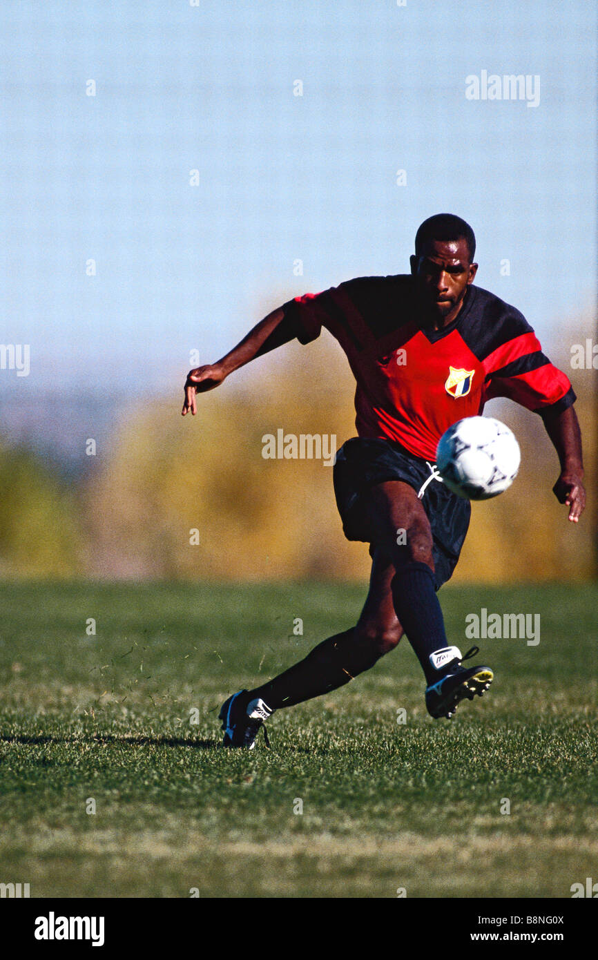 Soccer player in action Stock Photo - Alamy