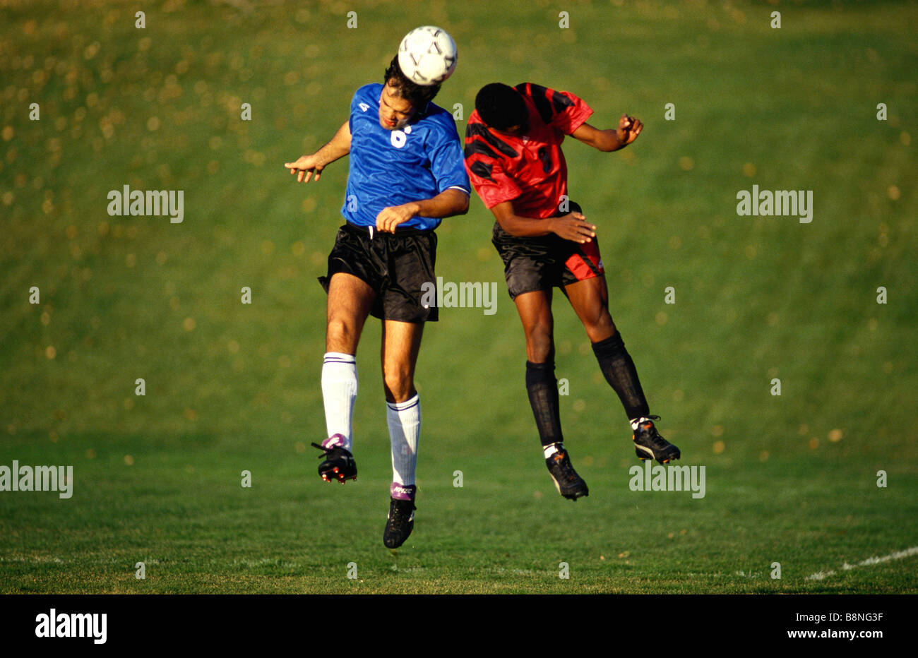 Soccer players in action Stock Photo - Alamy