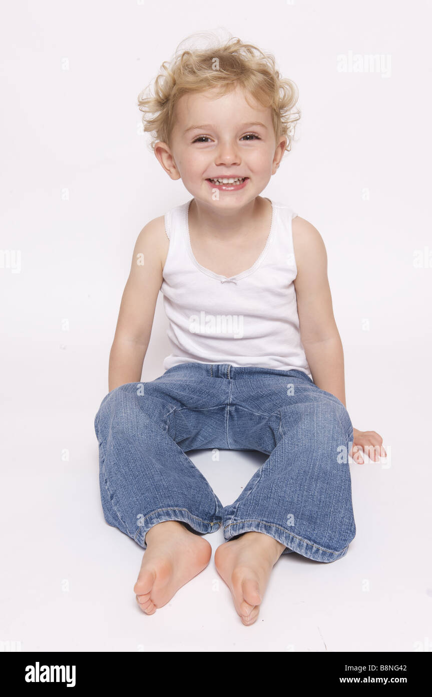Smiling two year old child on a white background Stock Photo - Alamy