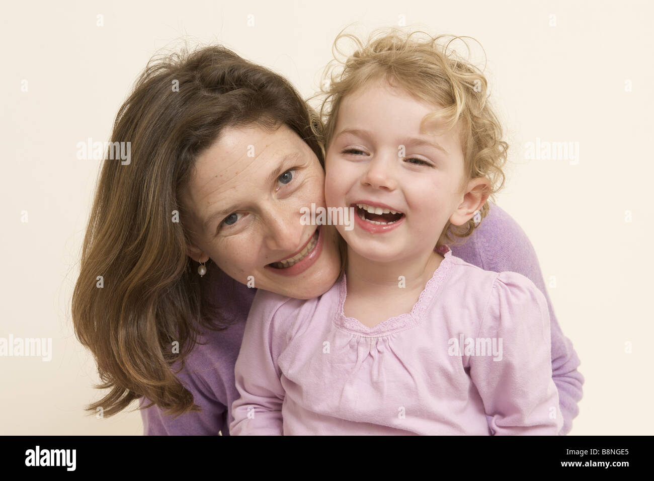 Laughing mother and child Stock Photo - Alamy