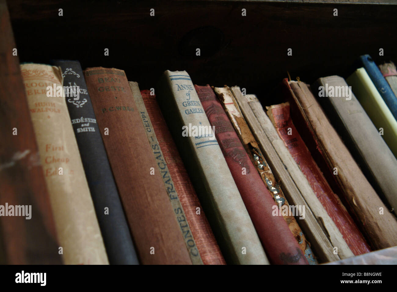 Old schoolbooks on the shelf of a restored 1940's village school room ...