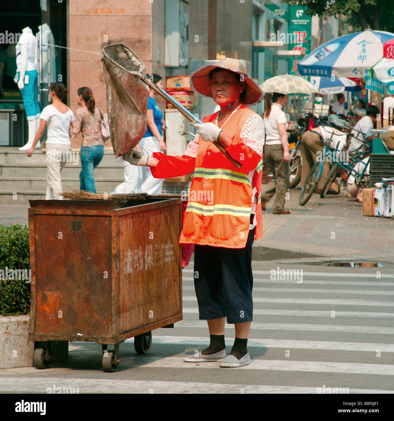 Street cleaner in high visibility hi-res stock photography and images ...