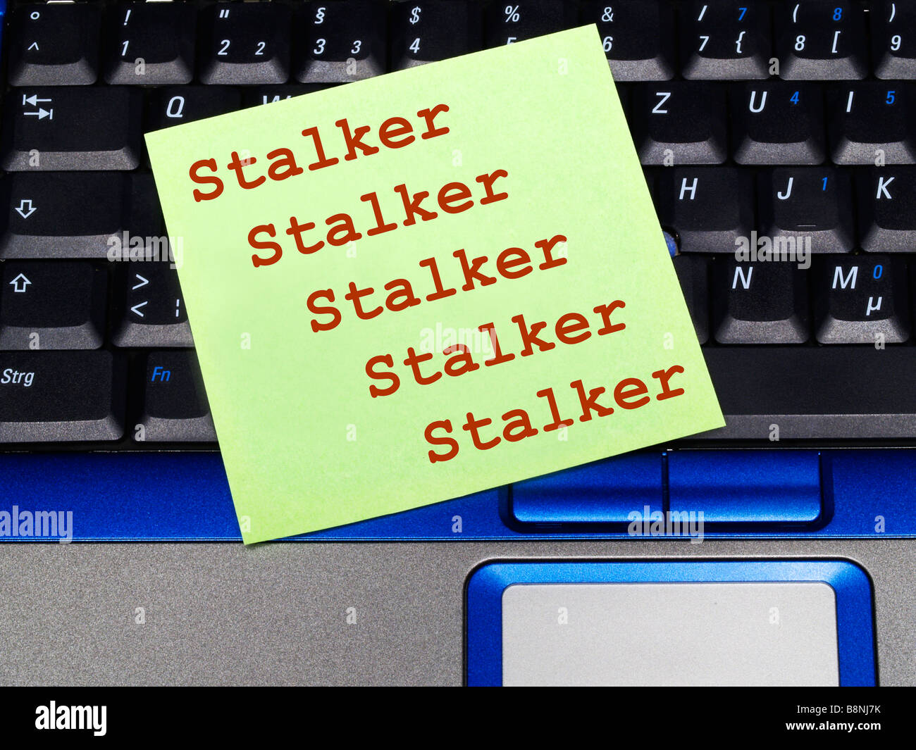 memo note on notebook, stalker Stock Photo - Alamy