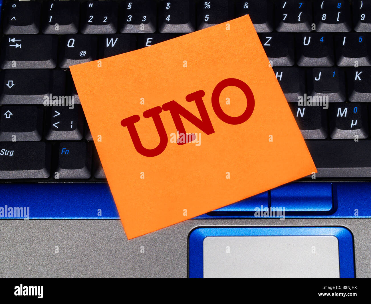 memo note on notebook, UNO Stock Photo - Alamy