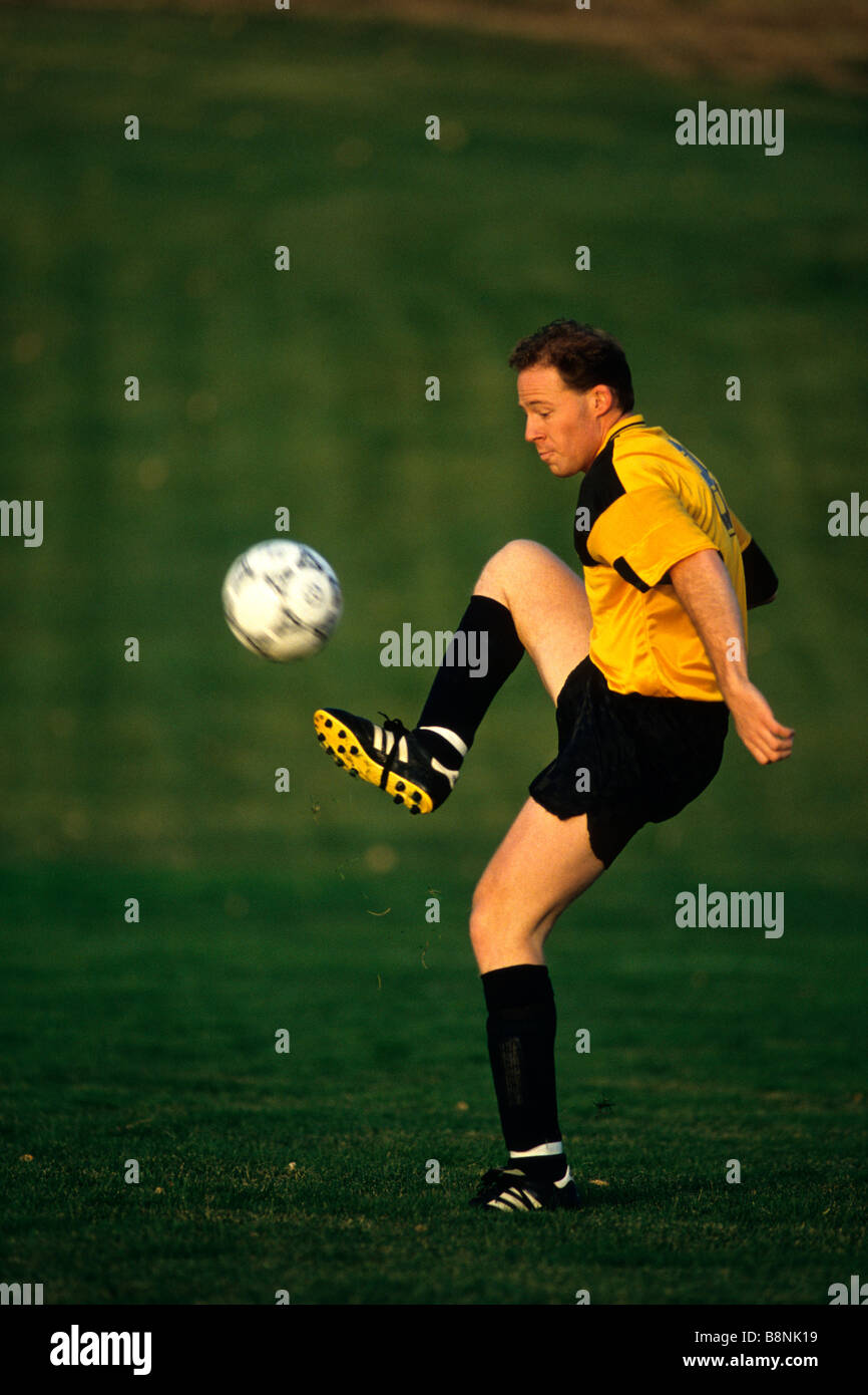 Male soccer player in action Stock Photo - Alamy
