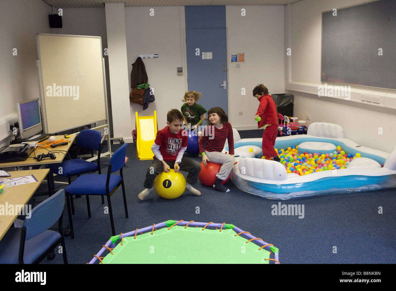 Children playing at creche hi-res stock photography and images - Alamy