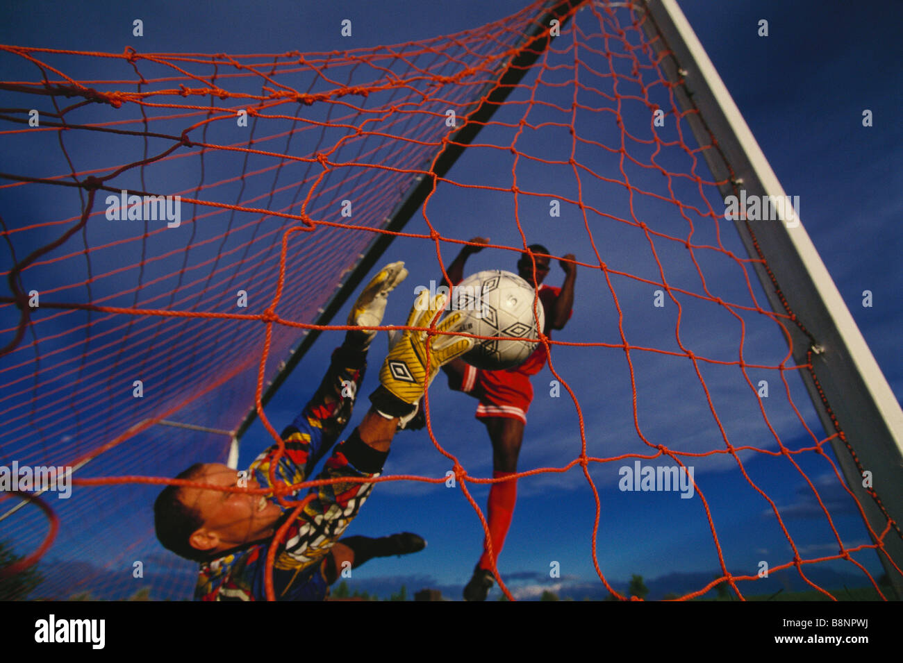 Soccer goalie blocking goal hi-res stock photography and images - Alamy