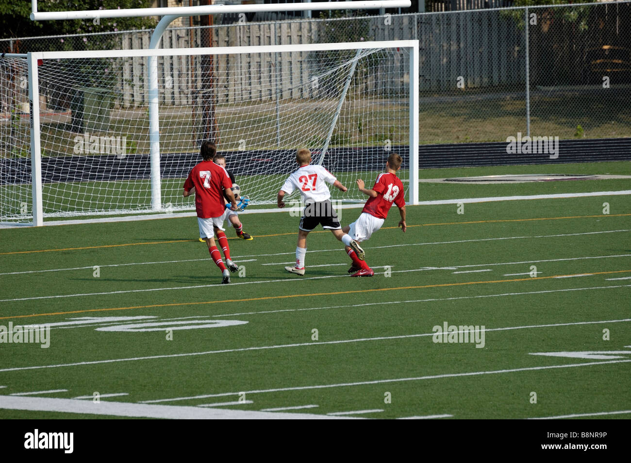 American high school teenage soccer players during a game Stock Photo ...