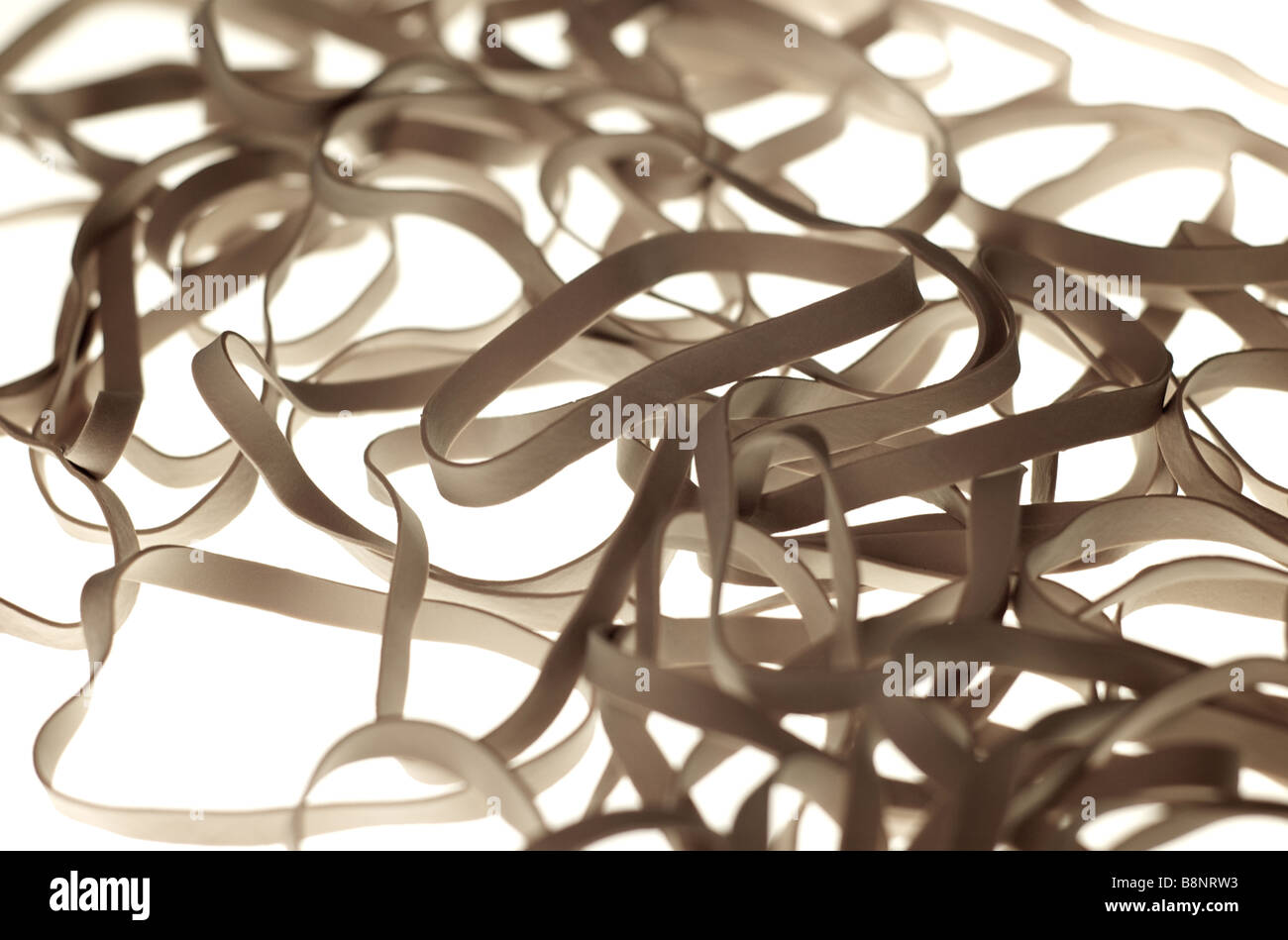 Random Scattered Rubber Bands With White Background Stock Photo - Alamy