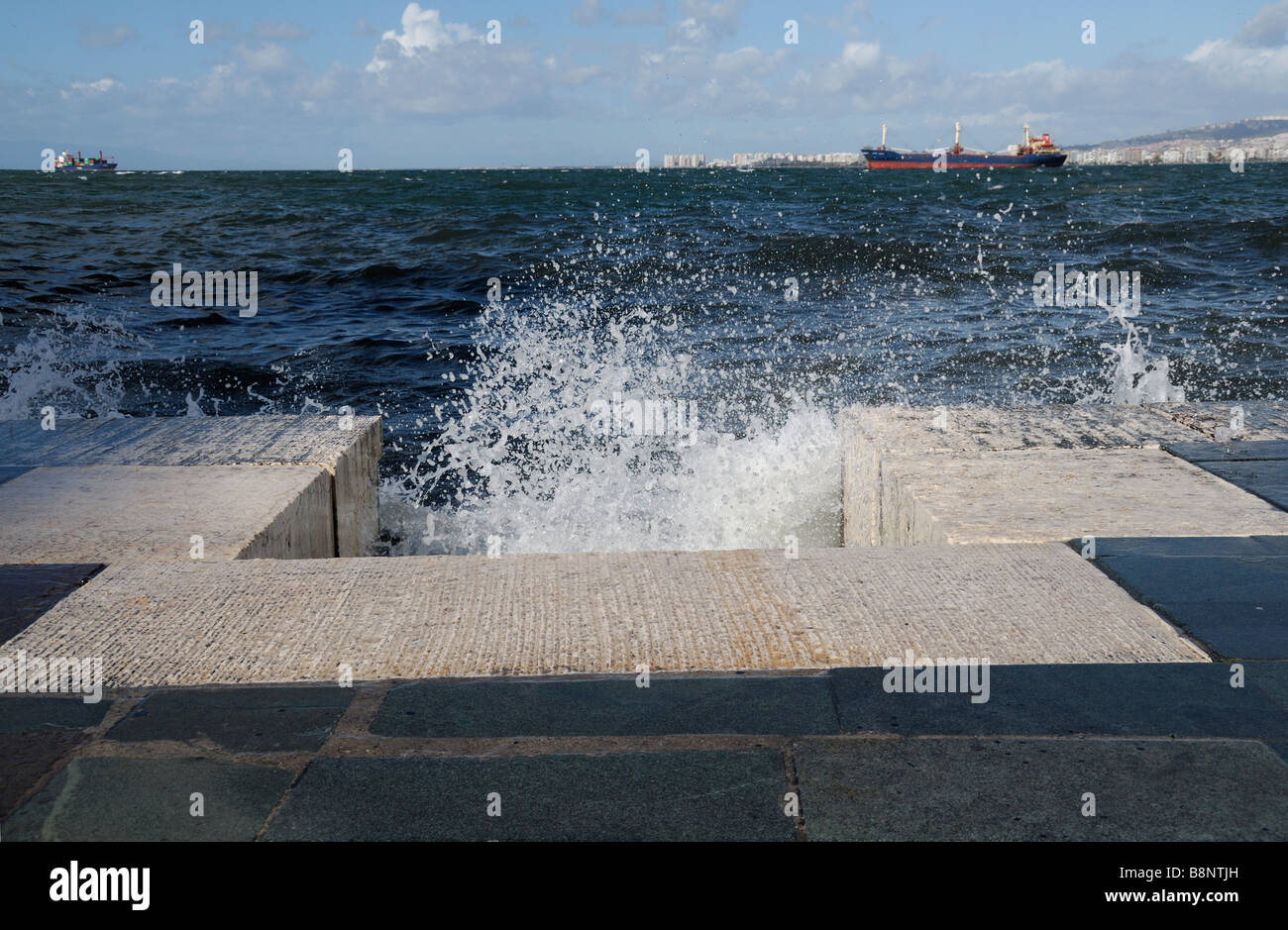 Stormy weather waves scrash crashing along the Kordon promenade ...