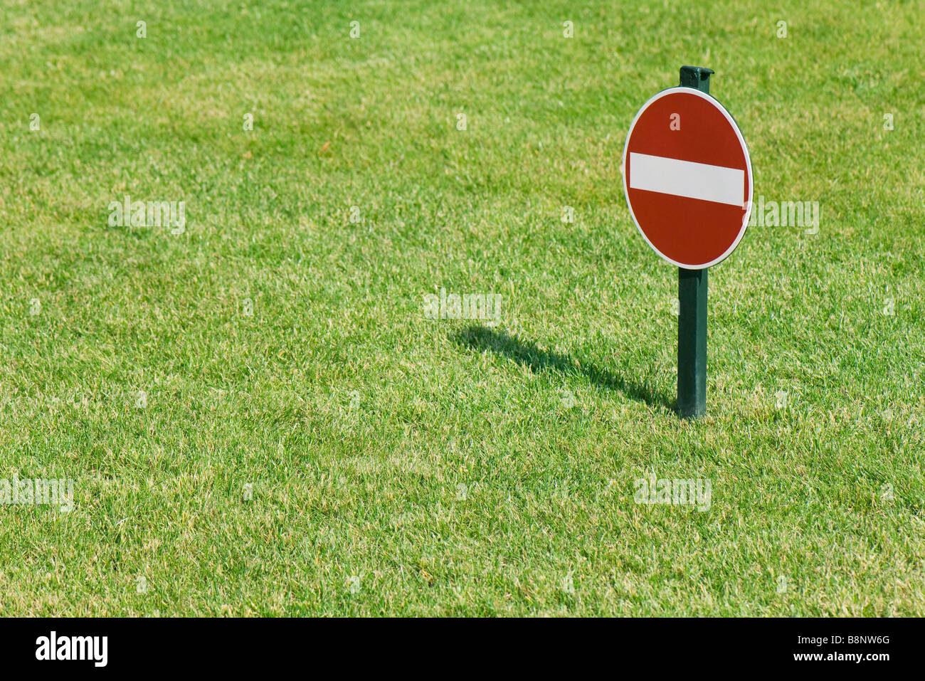 Do not enter sign on grass Stock Photo - Alamy