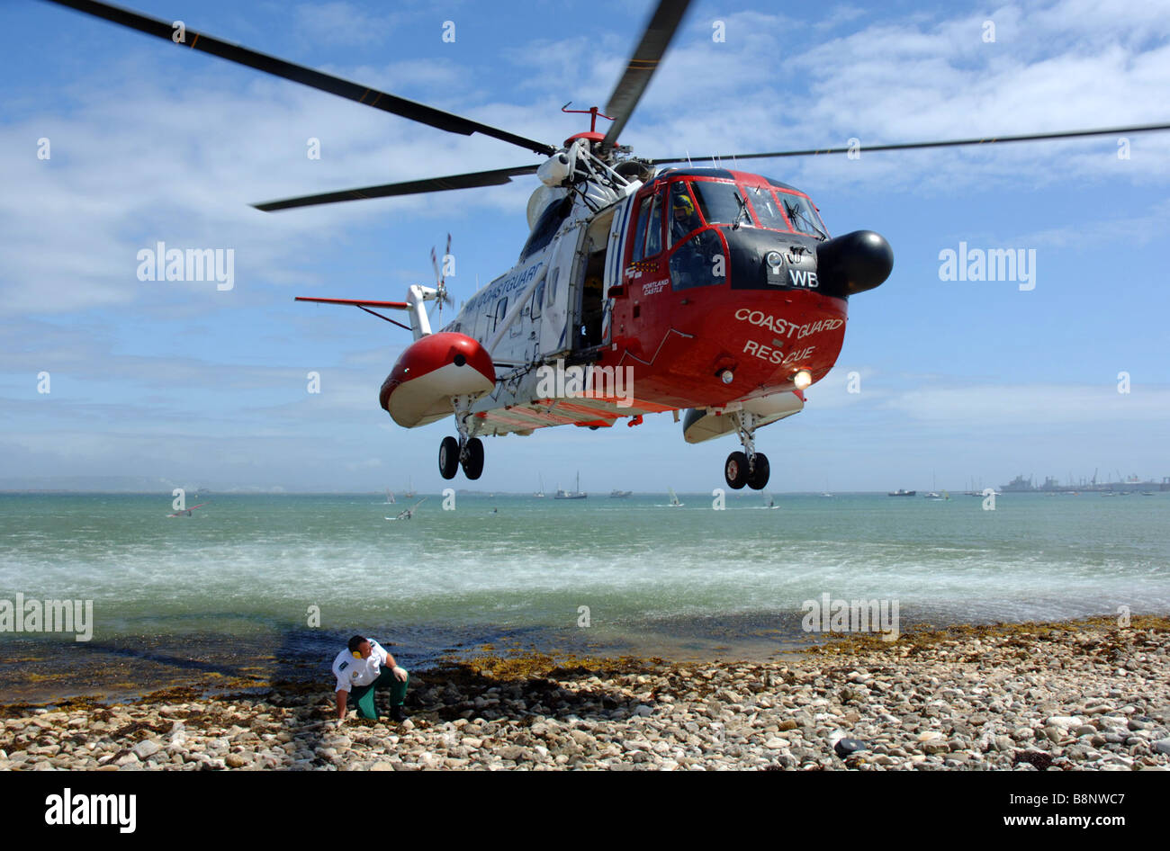 Coastguard Rescue Helicopter rescuing an injured person, Britain UK ...