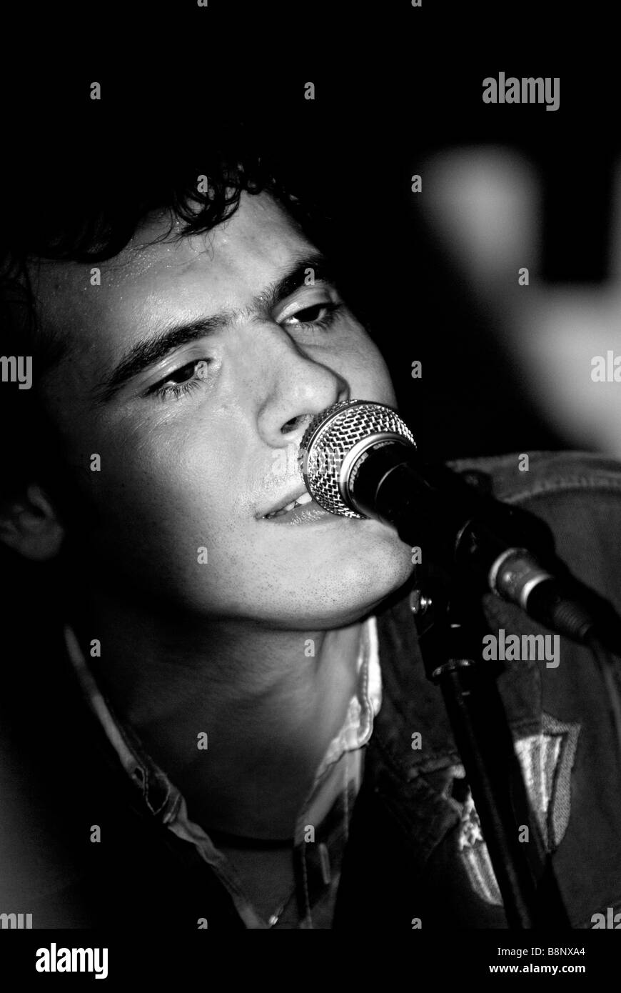 Male singer vocalist Black and White Stock Photos & Images - Alamy