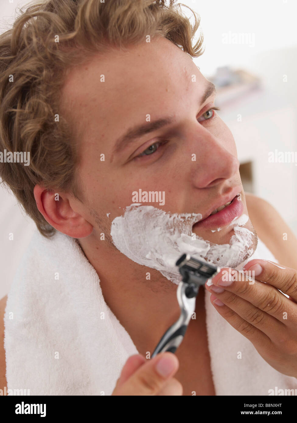 Shaving in bed hi-res stock photography and images - Alamy