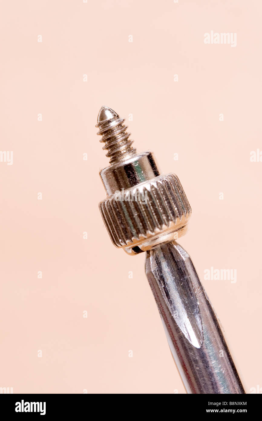 Tighten screw closeup hi-res stock photography and images - Alamy