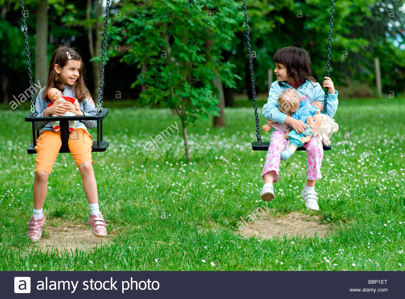 little girls play at the park Stock Photo: 22611760 - Alamy
