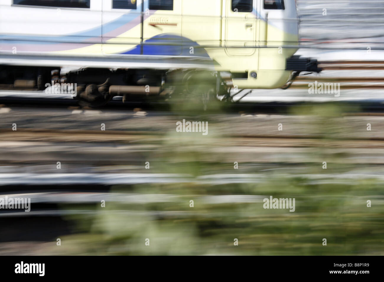 fast metro train carriage doors windows on tracks in city Stock Photo ...