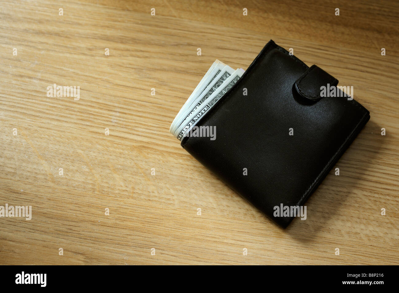 Wallet of bills hi-res stock photography and images - Alamy