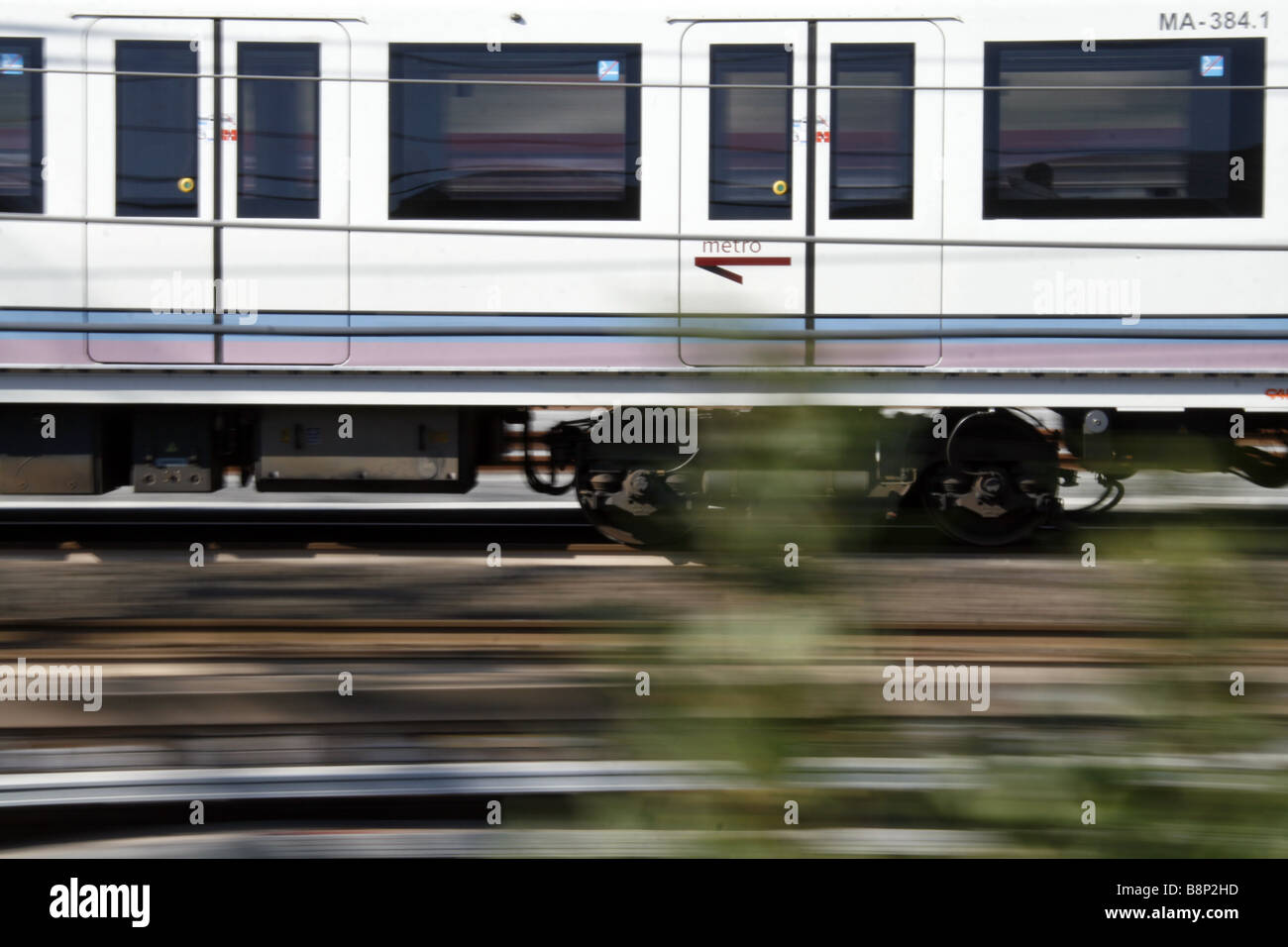fast metro train carriage doors windows on tracks in city Stock Photo ...