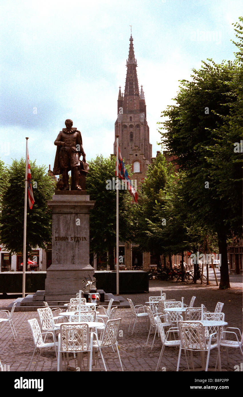 Cafe at Bruges and statue of Simon Stevin Stock Photo - Alamy