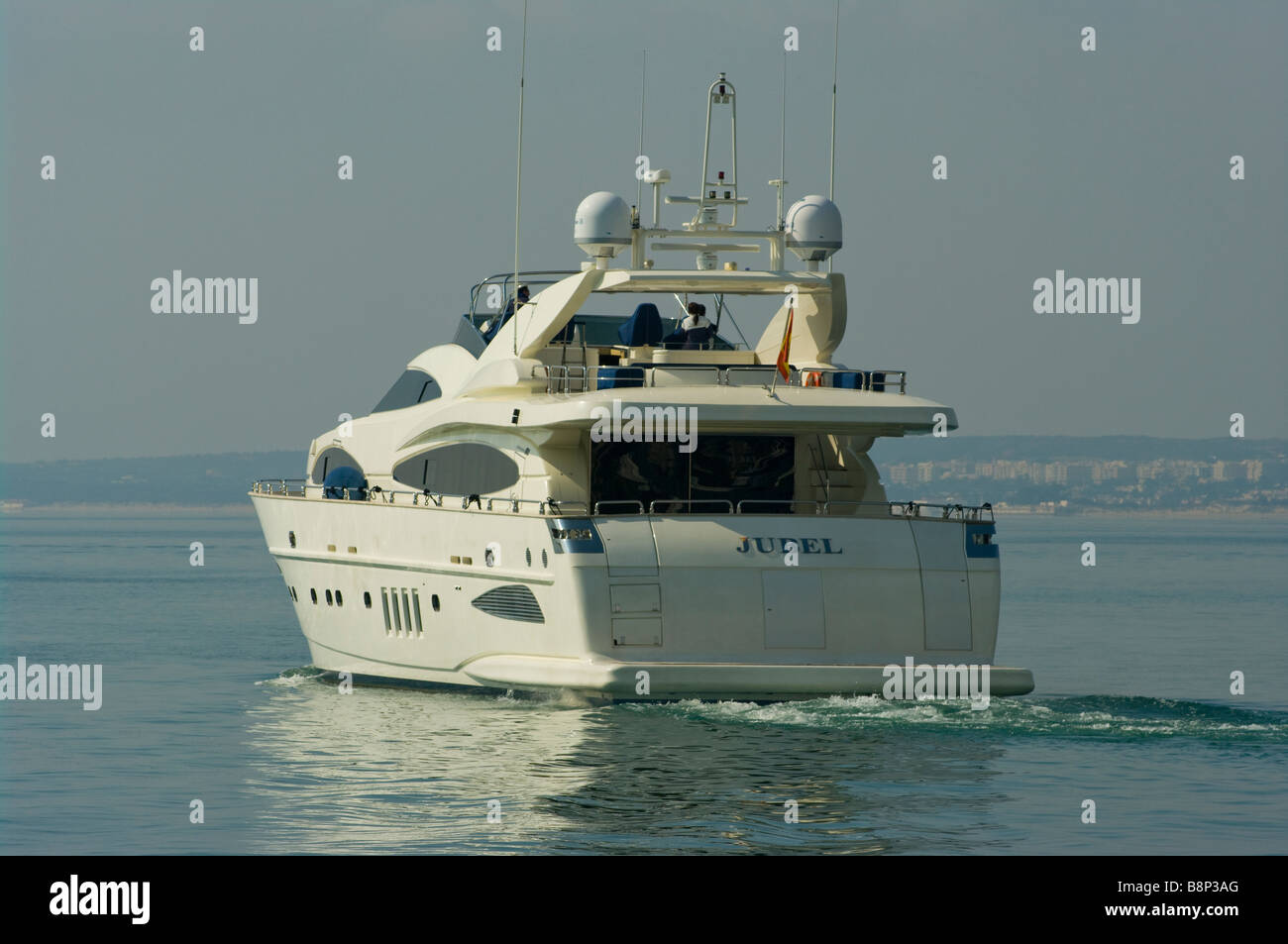 Large Luxury Expensive Motor Cruiser Yacht Boat at Sea Stock Photo - Alamy