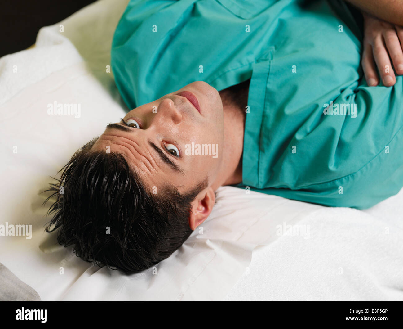man on operating theatre table waiting for operation Stock Photo - Alamy