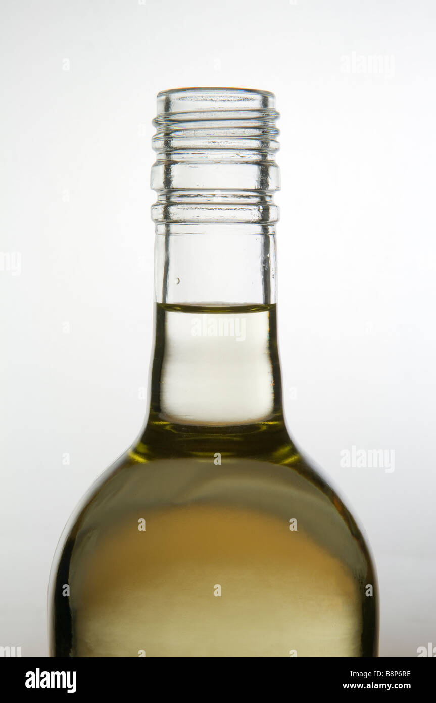 Screw thread on a bottle of white wine Stock Photo - Alamy