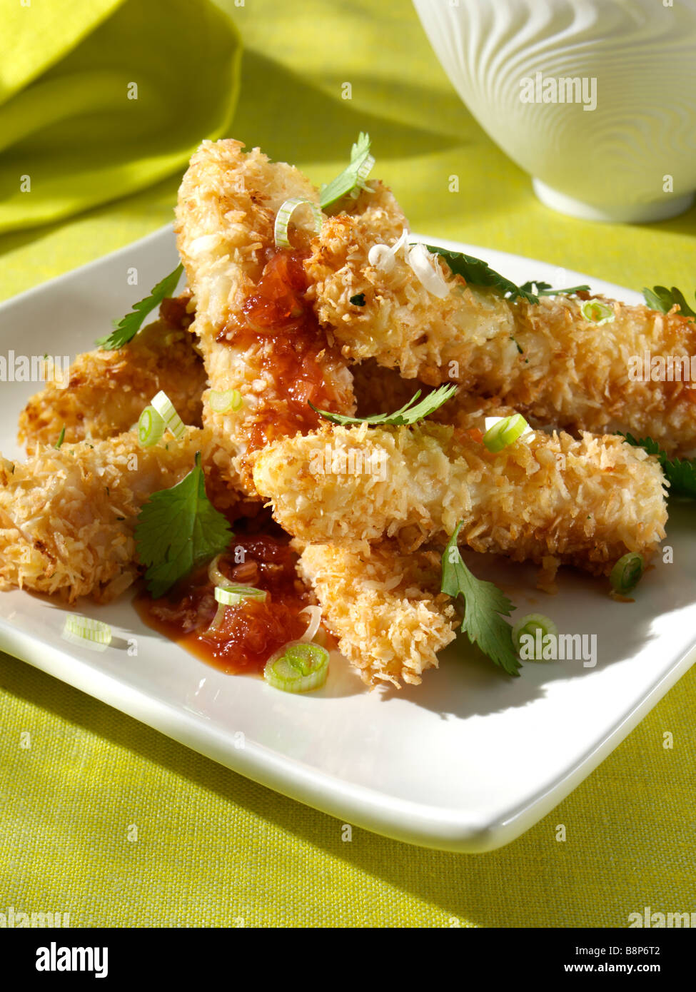 Thai coconut fish goujons Stock Photo - Alamy