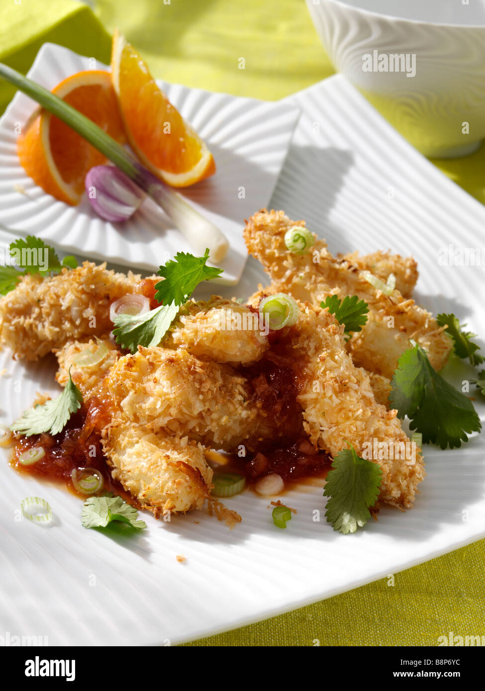 Thai coconut fish goujons Stock Photo - Alamy