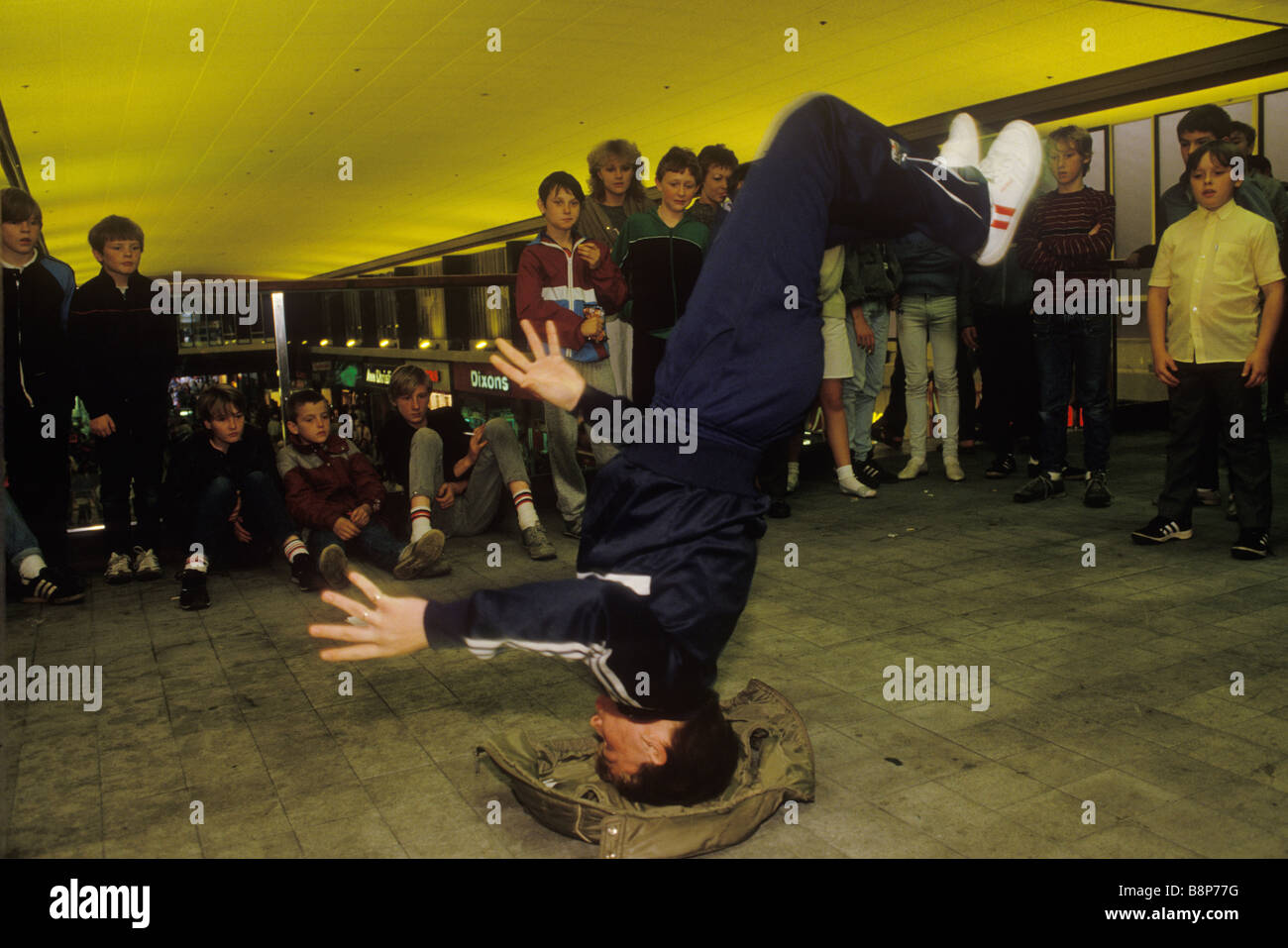 Teenagers breakdancing 1980s in a shopping centre Stockport Lancashire ...