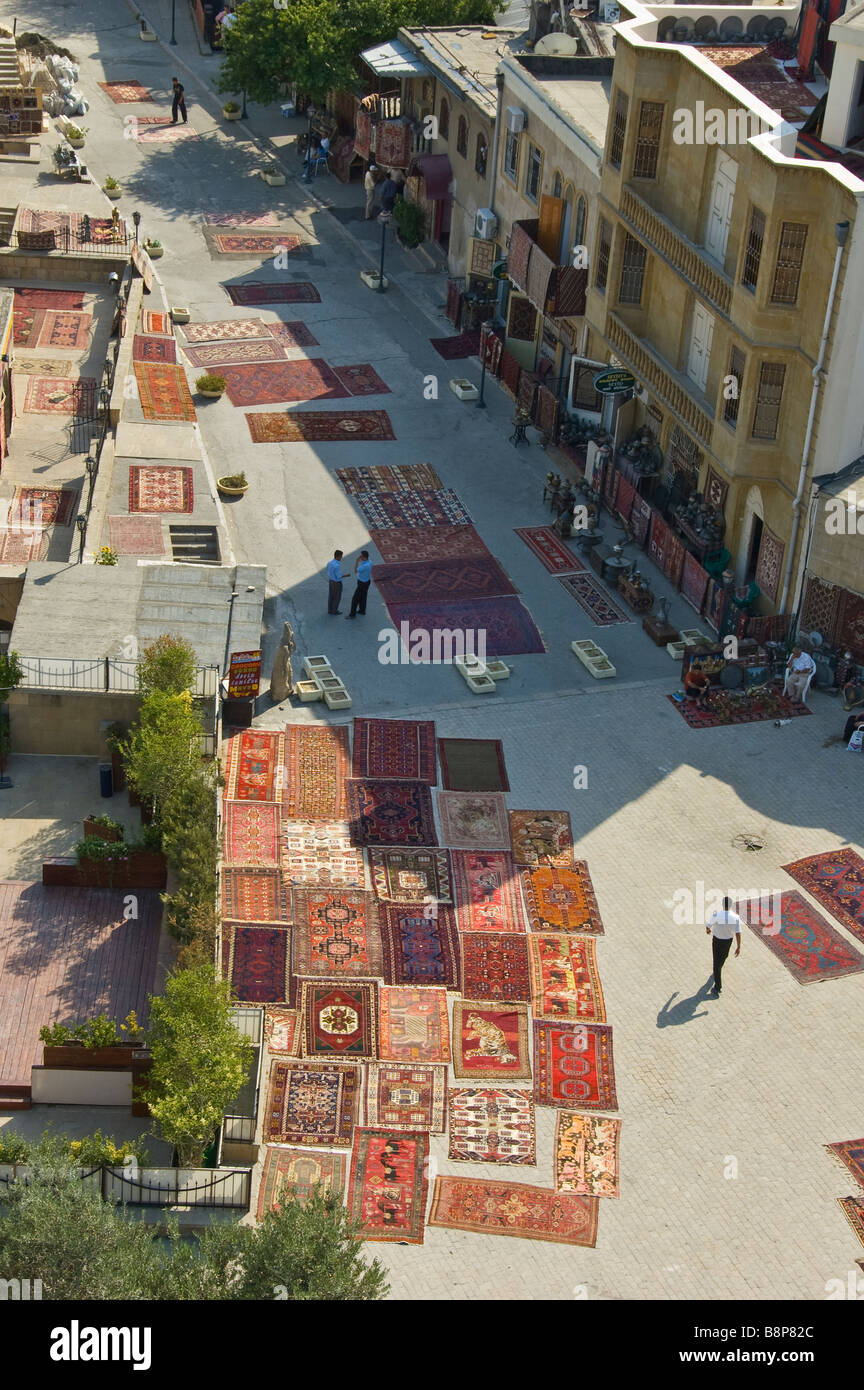 Persian carpets for sale, lining the streets of Baku, Azerbaijan Stock ...