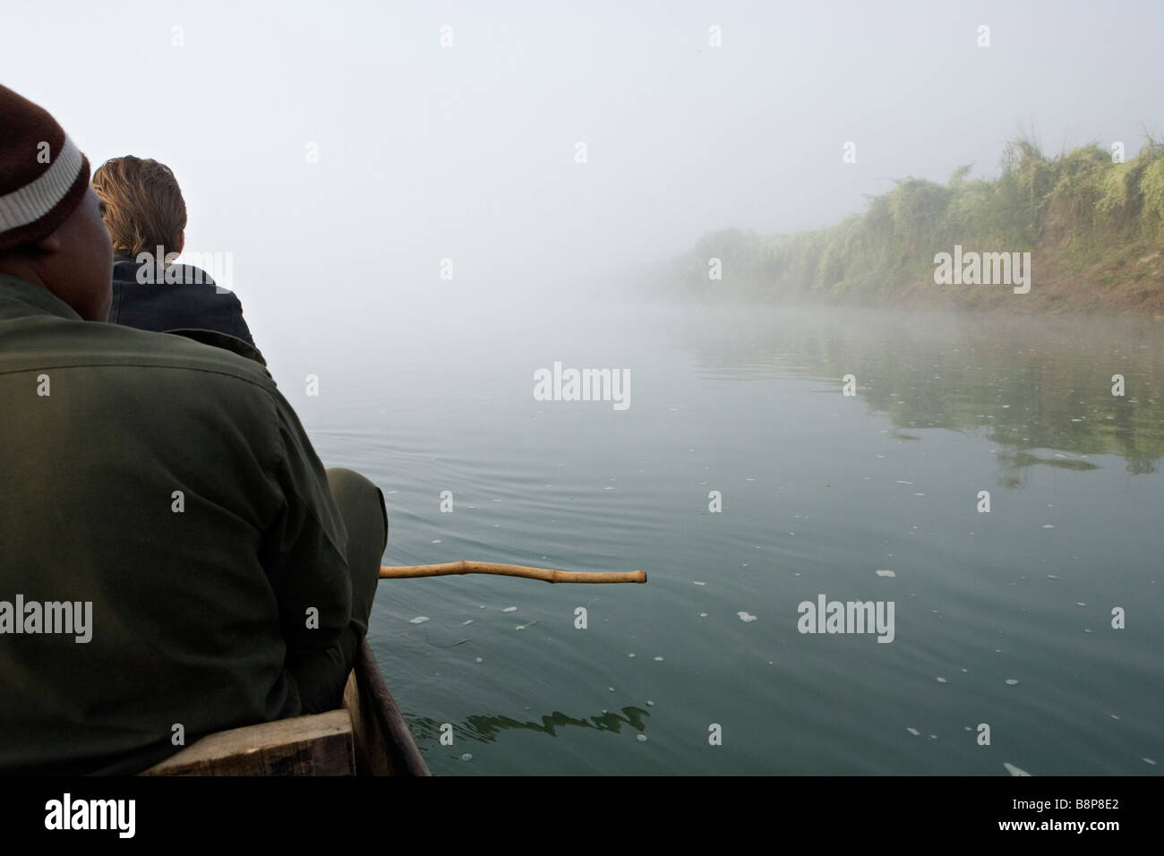 Early morning canoe trip on Rapti river in Royal Chitwan National Park ...