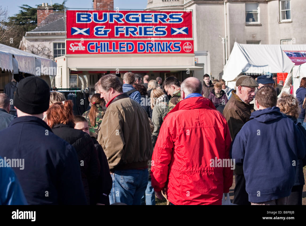 people queuing at a "fast food" "burger bar Stock Photo - Alamy