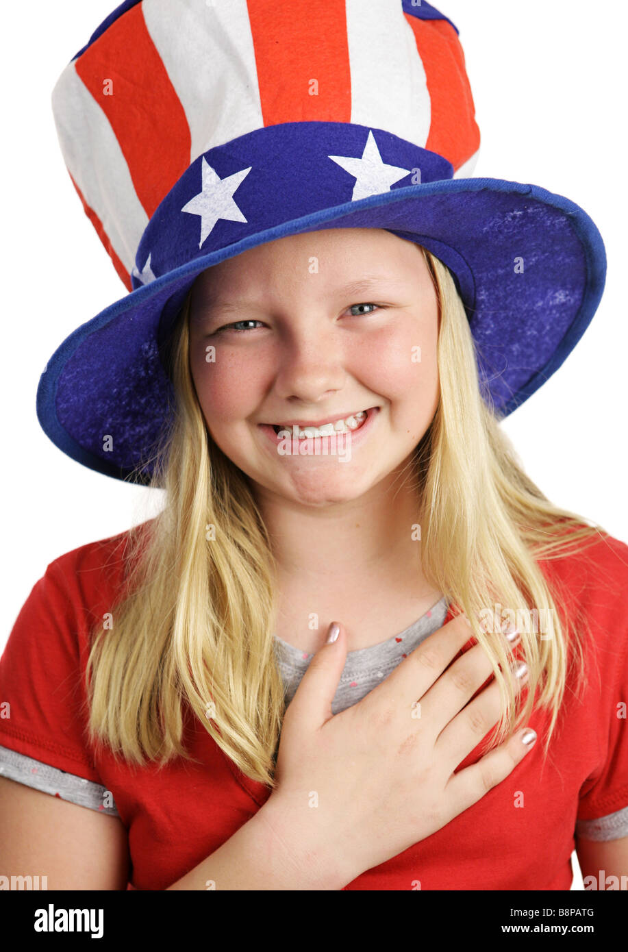A pretty American girl smiling and saying the Pledge of Allegiance ...