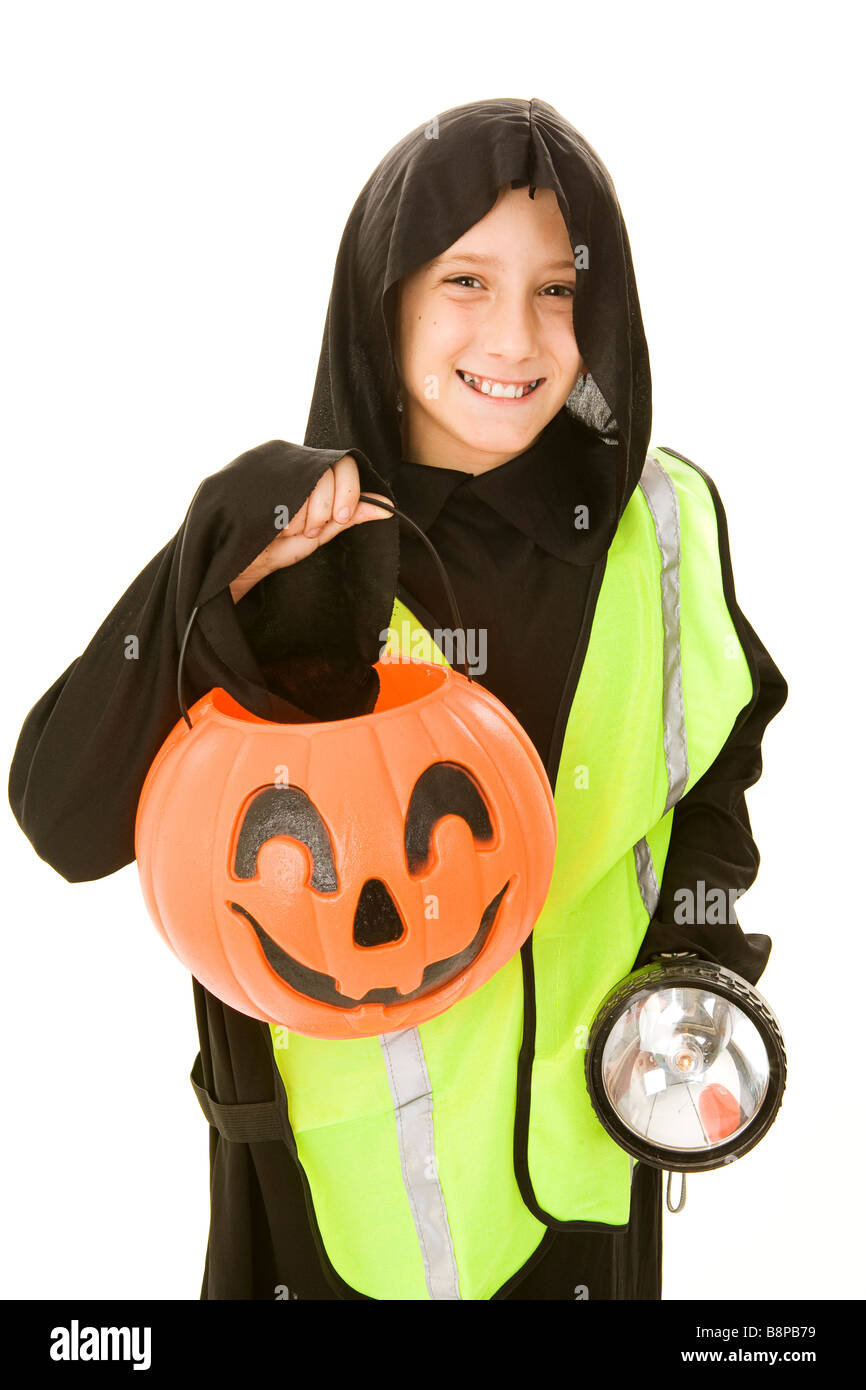 Adorable little boy in his Halloween costume with a reflective vest and ...