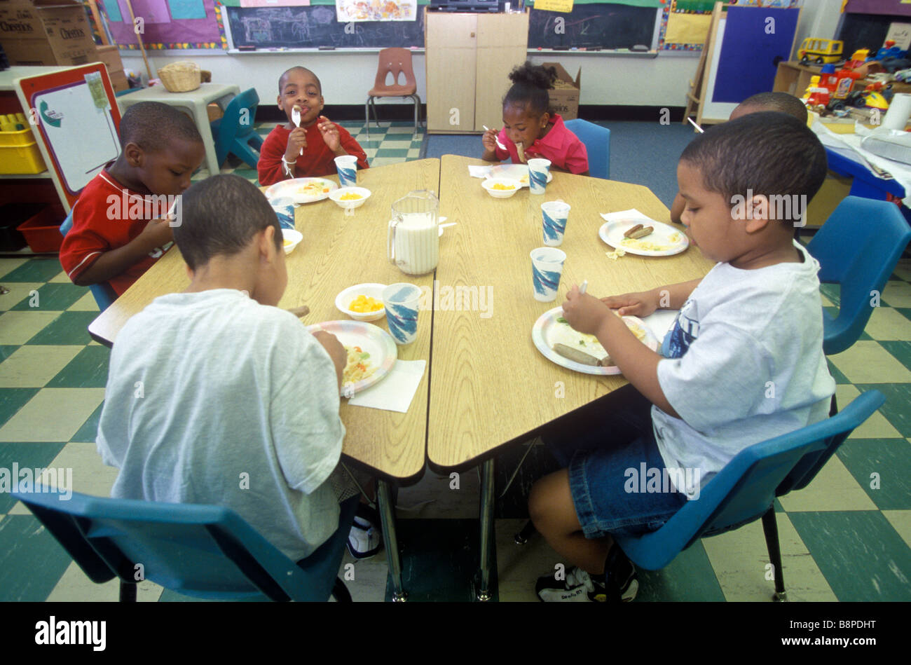 Students Eating Lunch In Classroom High Resolution Stock Photography ...